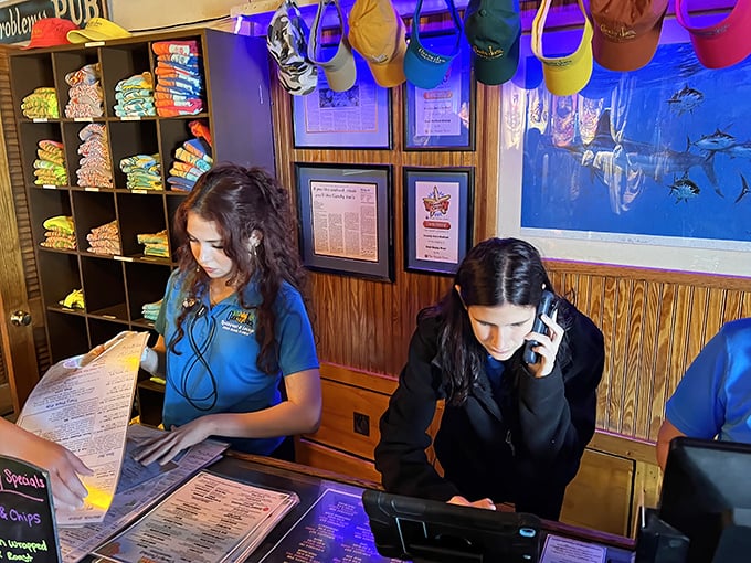 Behind every great seafood joint is a team that knows their stuff. These folks are the keepers of the conch fritter secrets.