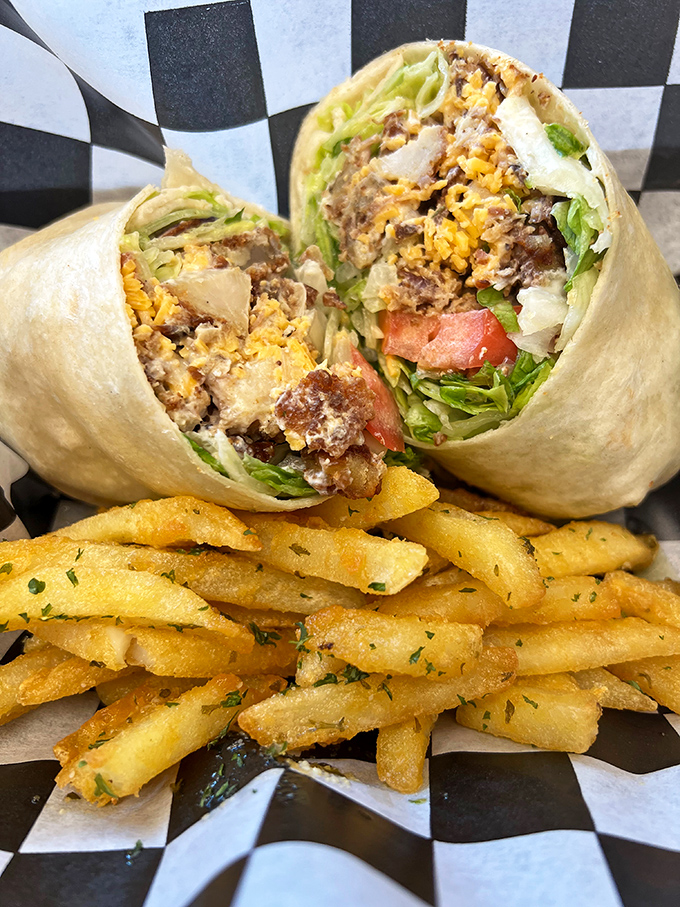 This wrap means business &ndash; packed with fresh ingredients and paired with herb-dusted fries for a meal that satisfies without weighing you down.
