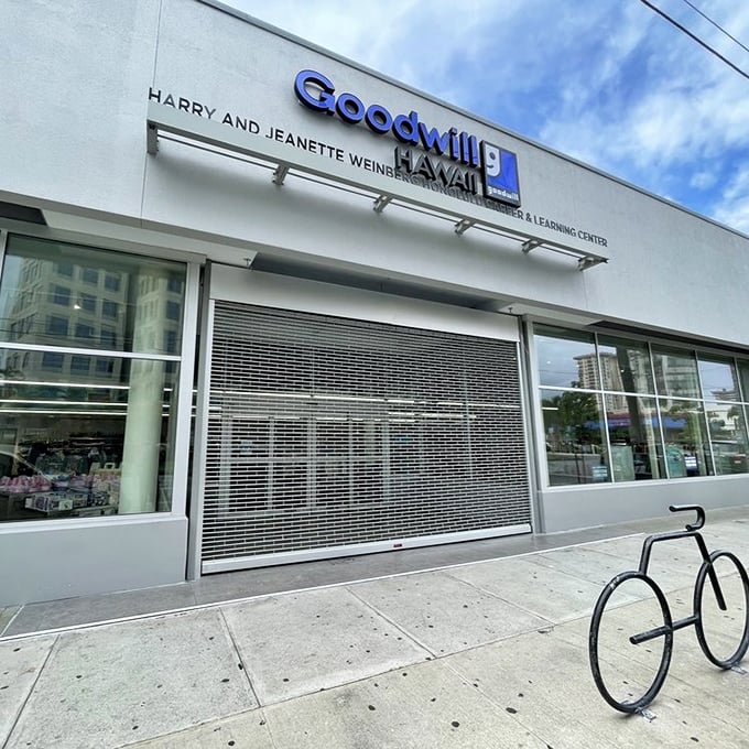 The Goodwill's iconic blue sign promises more than just shopping&mdash;it's an invitation to the ultimate Hawaiian scavenger hunt.