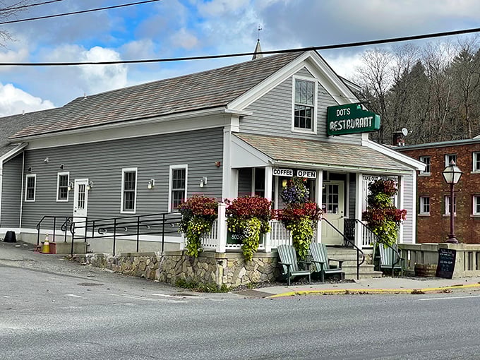 Hanging flower baskets frame the entrance like nature's welcome sign. Dot's storefront promises comfort food and small-town hospitality in equal measure.