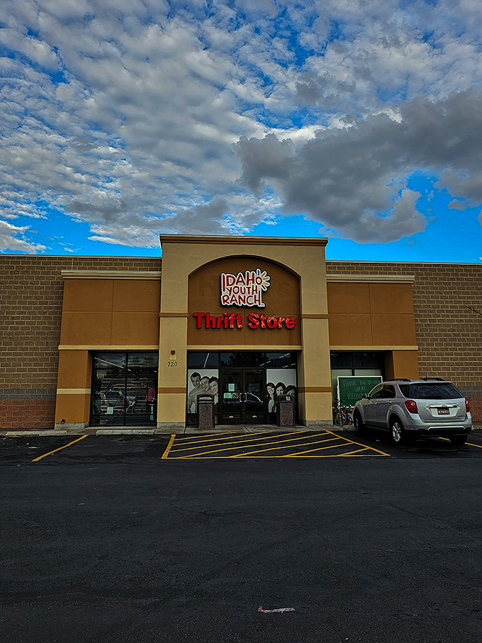Dramatic clouds frame the building like nature's way of saying this place deserves a spotlight.