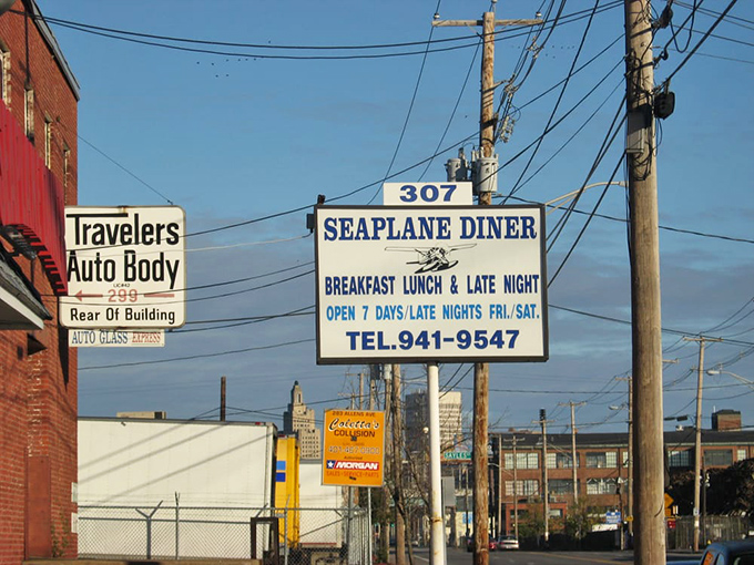 The roadside sign promises the essentials: breakfast, lunch, and late night eats seven days a week&mdash;a 24-hour beacon for the hungry traveler.