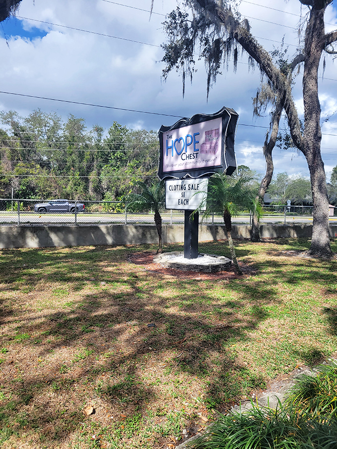 The iconic HOPE Chest sign stands sentinel by the roadside, a beacon for savvy shoppers who know that one person's castoffs become another's treasures.