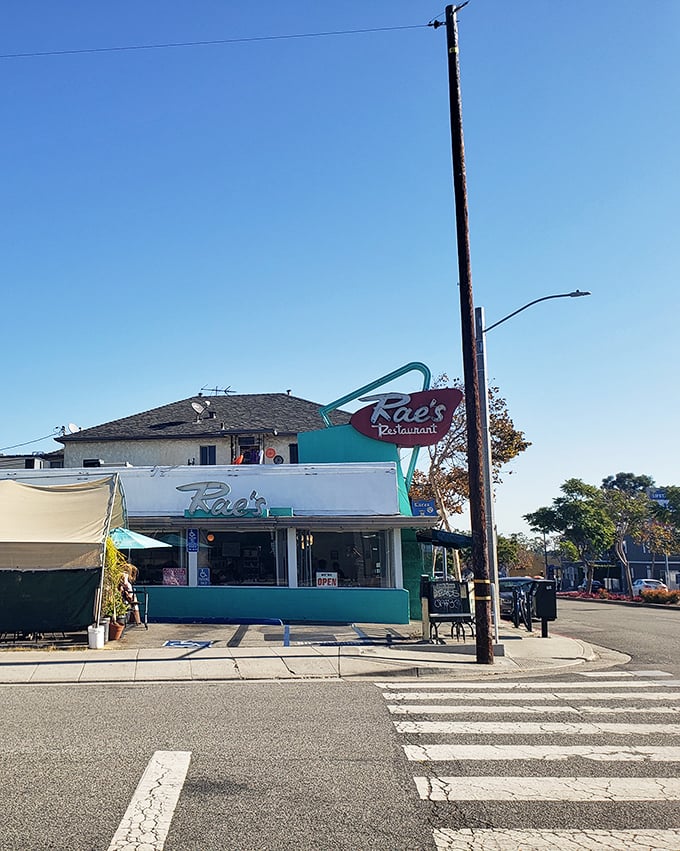 That neon sign visible from blocks away acts like a lighthouse guiding hungry souls to reasonably priced breakfast salvation.