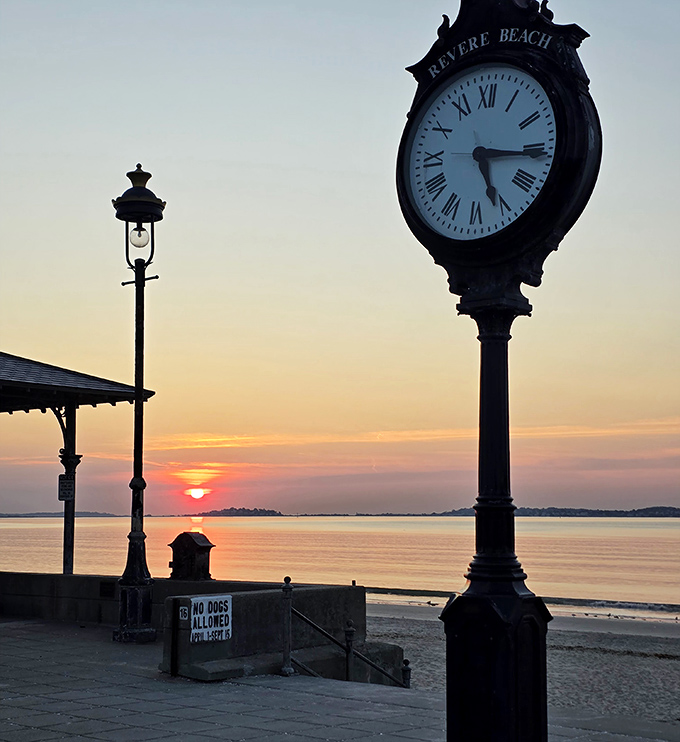 The iconic Revere Beach clock captures sunset's golden moment, proving that sometimes the best luxury is simply being in the right place at the right time.