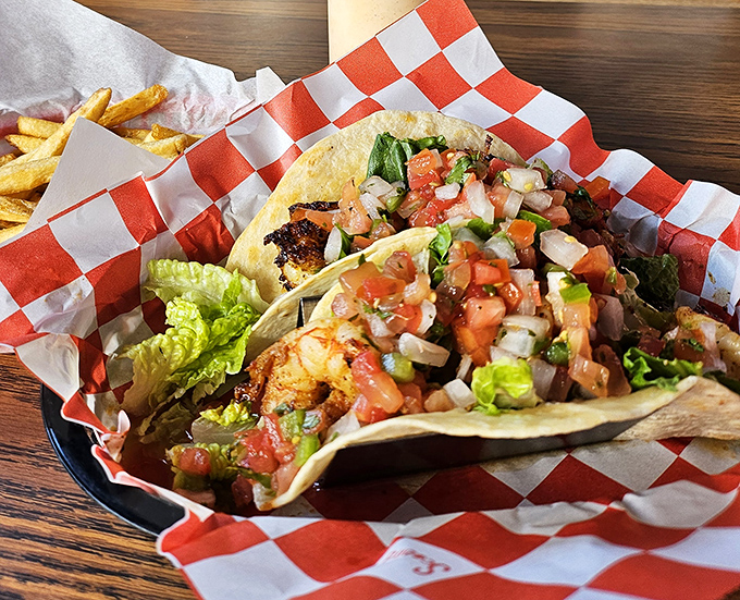 Fish tacos dressed for success with fresh pico de gallo. The kind of dish that makes you wonder why you'd ever settle for ordinary tacos again.