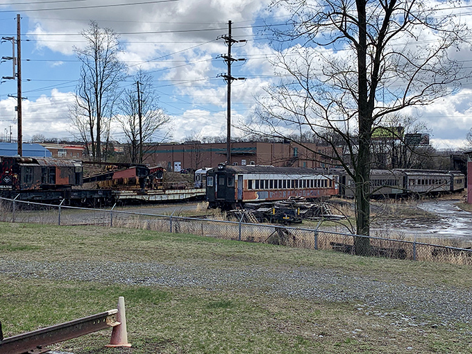 The sprawling train yard houses treasures awaiting restoration, each weathered car holding stories of Pennsylvania's railroad golden age.