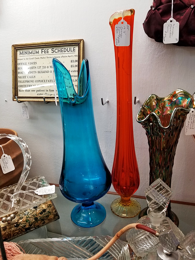 Blown glass in impossible colors captures light like liquid jewels. Your grandmother's dining room probably featured similar vases, filled with flowers from a suitor or garden.