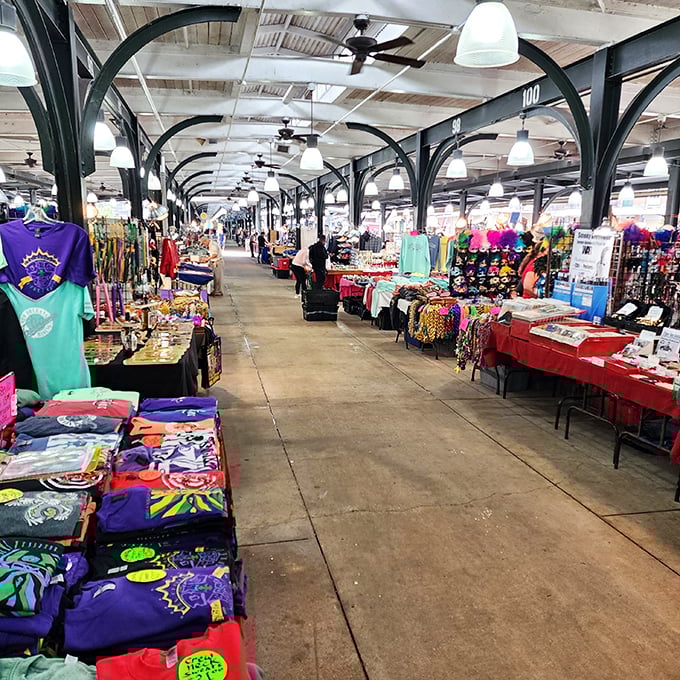The market's endless corridor stretches toward retail infinity, where each stall is a chapter in the story of New Orleans commerce.