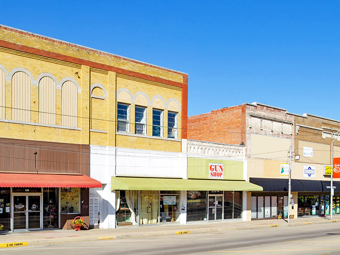 Historic charm meets small-town simplicity on Ada's Main Street, where these yellow brick buildings have witnessed generations of Oklahoma stories.