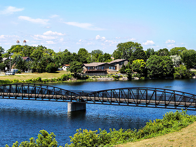 A peaceful bridge spans the calm waters of Thunder Bay, where Alpena's affordable charm meets nature's million-dollar views.