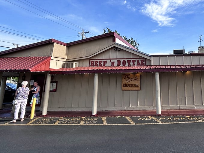 The unassuming exterior of Beef 'N Bottle hides a steakhouse paradise. Like finding a treasure map in your attic!