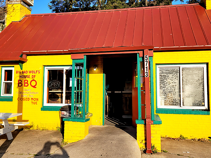 The bright yellow exterior of Big Bad Wolf's BBQ isn't just eye-catching&mdash;it's a beacon for hungry souls seeking smoky salvation.