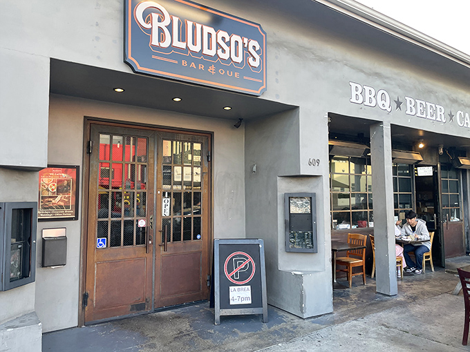 That smoky aroma drifting from the doorway promises barbecue magic waiting inside this Los Angeles gem.