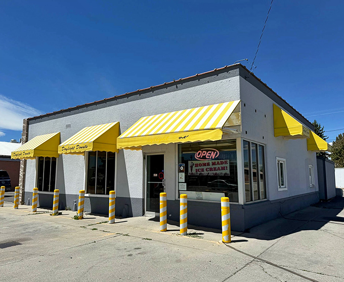 The sunshine-yellow awnings of Daylight Donuts beckon like a sweet mirage in the Wyoming landscape.