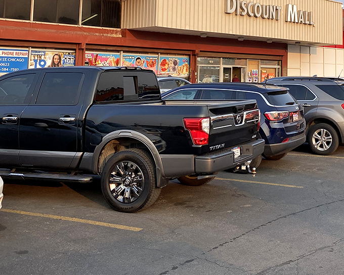 The classic storefront of Chicago's Discount Mall beckons bargain hunters with its no-frills charm and promise of treasures within.