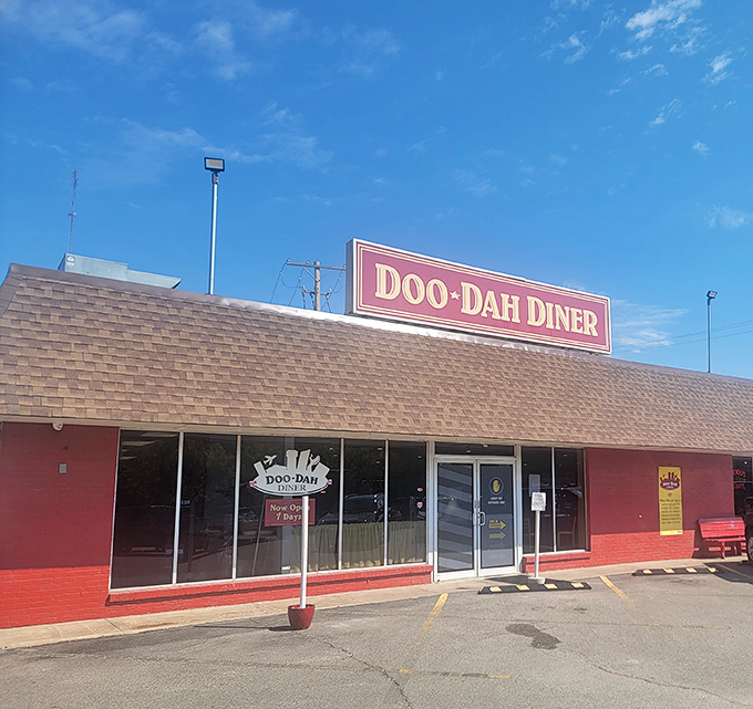 The bright red exterior of Doo-Dah Diner promises comfort food salvation like a beacon in Wichita's urban landscape.