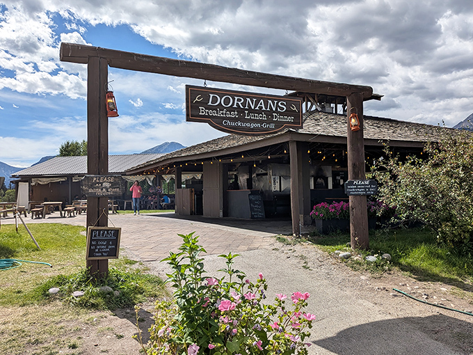 Rustic mountain charm meets pizza paradise! The wooden beams and mountain backdrop create the perfect setting for a memorable slice.