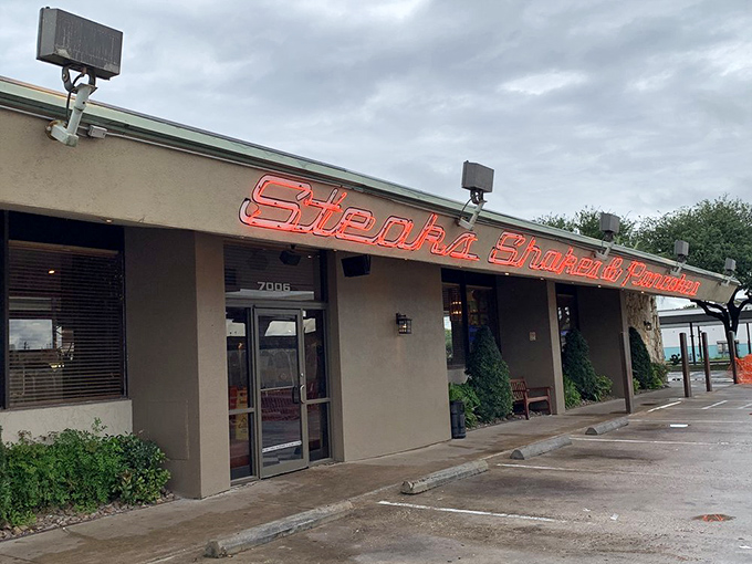 The neon glow of Dot Coffee Shop beckons like an old friend. This Houston landmark has been serving comfort food dreams since before Instagram made food photos cool.