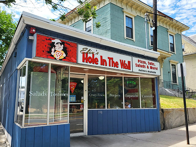Eliu's Hole in the Wall: The blue storefront doesn't lie&mdash;this truly is a delightful hole in the wall, promising pizza treasures for those brave enough to venture inside.