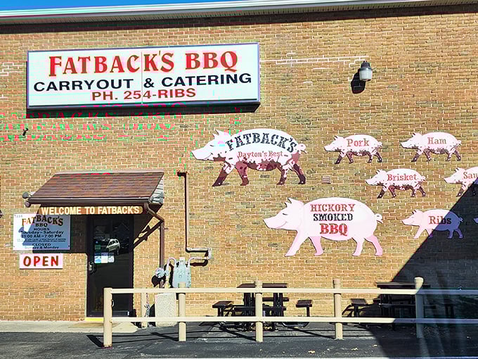The pig cutouts on Fatback's brick wall tell you everything &ndash; this place means serious barbecue business!