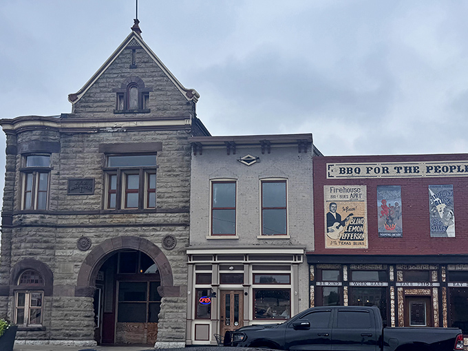 The historic stone firehouse exterior stands proud, promising smoky treasures within. BBQ for the people, indeed!