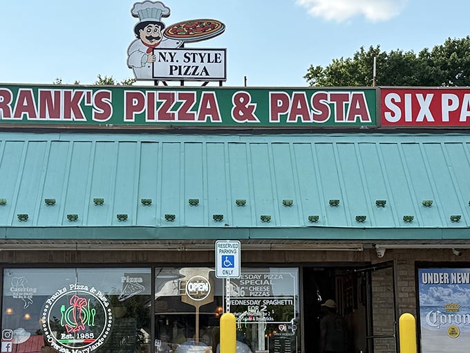 That cheerful pizza chef sign promises good things ahead &ndash; like a culinary lighthouse guiding hungry souls home. 