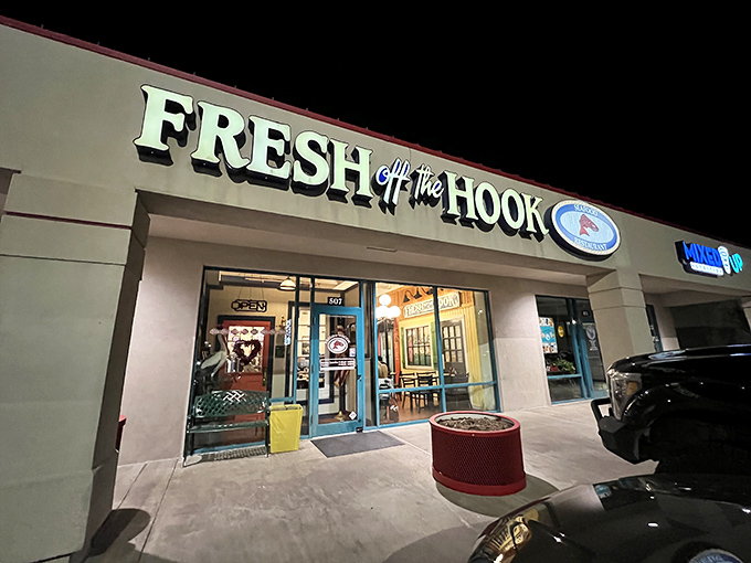 Fresh Off the Hook's illuminated storefront beckons seafood lovers like a lighthouse for the landlocked. Ocean treasures await inside!