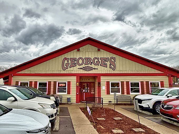George's Family Restaurant exterior - The red-trimmed facade of George's practically screams "comfort food inside!" Like a beacon for hungry souls seeking meatloaf salvation.