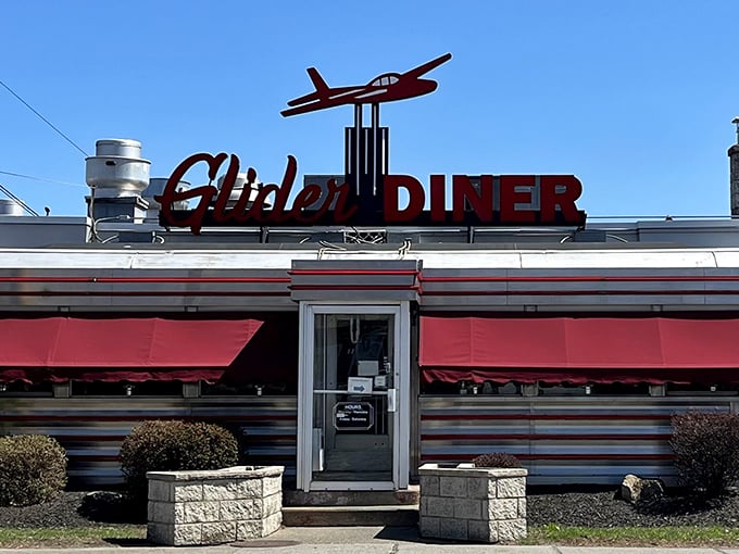 The Glider Diner's iconic airplane sign soars above Scranton, promising comfort food that'll make your taste buds take flight.