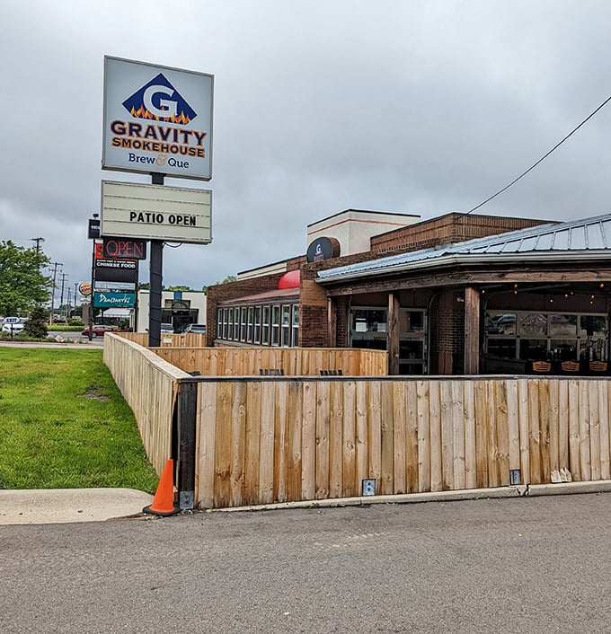 Gravity Smokehouse's wooden patio fence isn't keeping secrets &ndash; that smoky aroma has already escaped and is luring in the neighborhood.