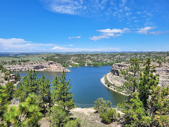 Crystal-clear waters stretch endlessly, making this Wyoming reservoir look like nature's own swimming pool paradise.