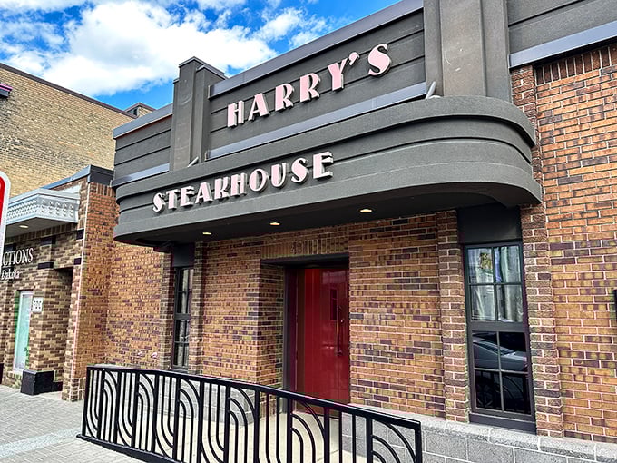 Harry's Steakhouse: That classic brick facade and bold red door practically whisper, "Come in, the steaks are sizzling and the conversation's flowing!"