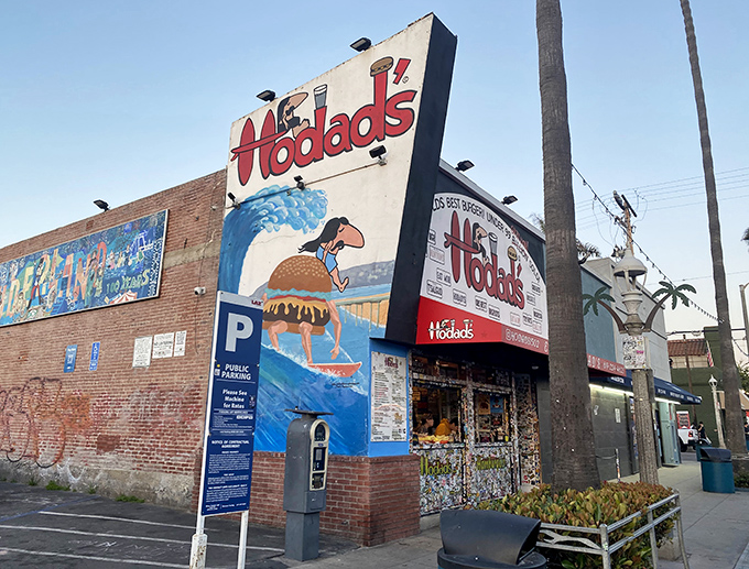 Hodad's iconic storefront with its surfing burger mural - a beacon of hope for the hungry beach crowd.