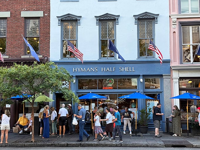 The iconic blue facade of Hyman's Seafood draws crowds like moths to a delicious flame. Charleston's seafood landmark stands ready for another day of happy diners.