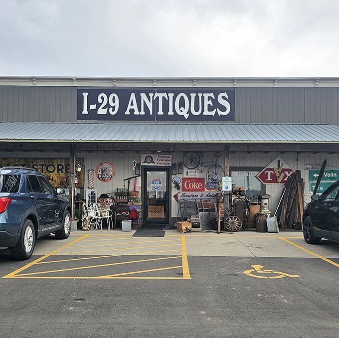 The exterior of I-29 Antiques doesn't flaunt its treasures - like a pirate chest disguised as a toolbox, its plain facade hides countless wonders inside.