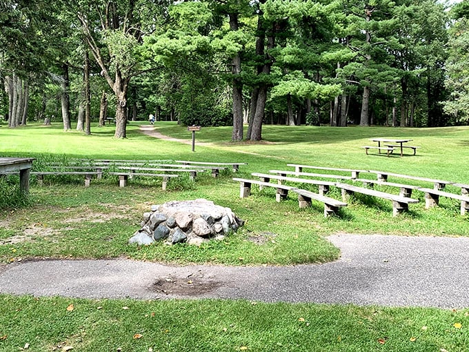 A peaceful amphitheater nestled among towering pines at Itasca State Park. Nature's classroom where the only homework is relaxation.