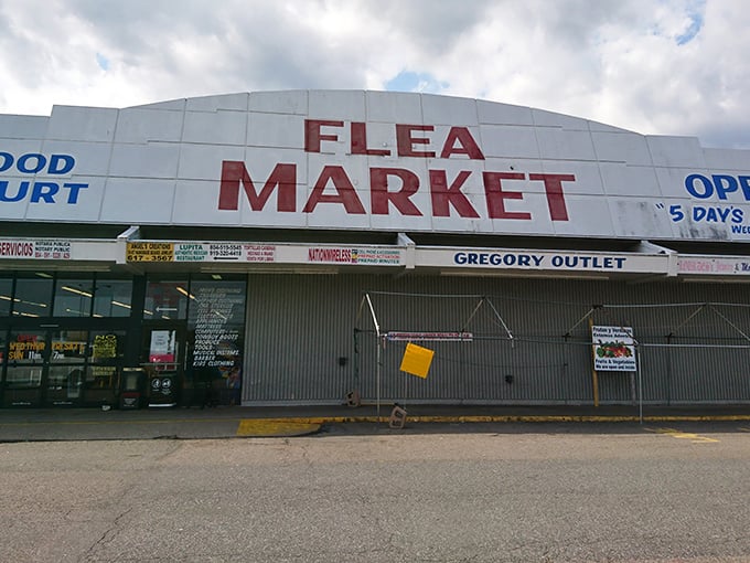 The sign says it all! This massive flea market promises treasures behind those doors that'll make any bargain hunter's heart race.