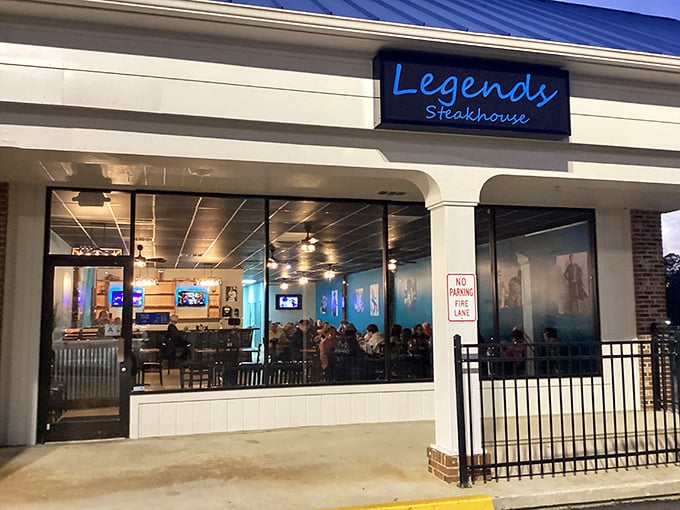 The blue neon glow of Legends Steakhouse beckons like a lighthouse for hungry souls. Simple outside, spectacular inside!