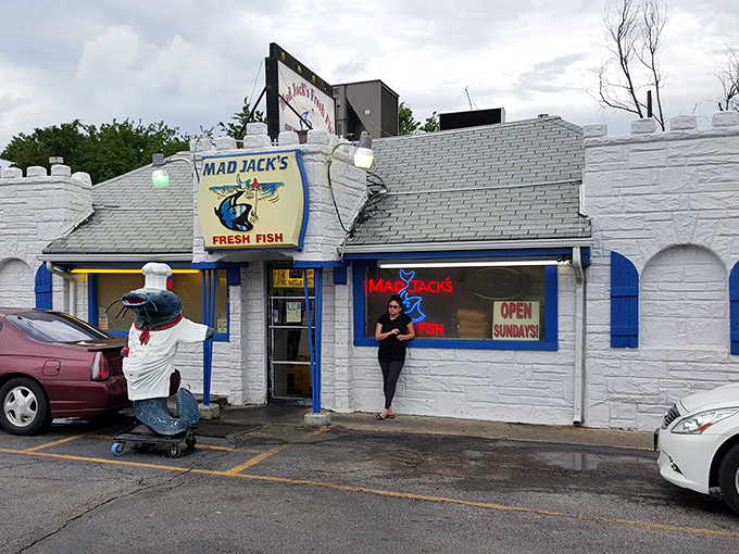 Mad Jack's iconic white building with blue trim stands out like a maritime mirage in Kansas City. That fish mascot isn't just decoration&mdash;it's a promise of good things to come!