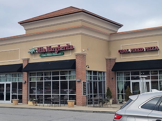 The welcoming storefront of Mia Margherita beckons with its promise of coal-fired perfection. Pizza paradise awaits behind those doors!
