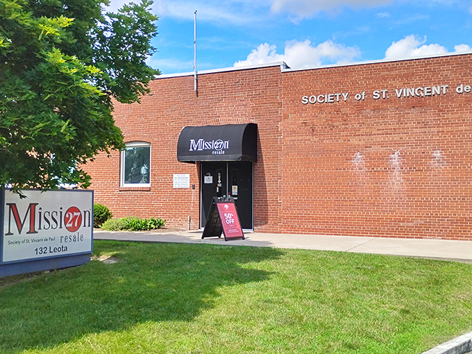 The brick facade of Mission 27 Resale promises treasures within. Like a secondhand Narnia, this unassuming entrance leads to a world of affordable wonders.