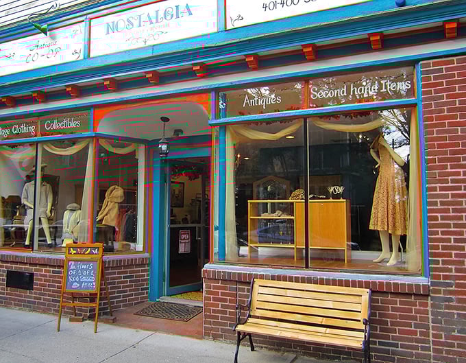 The colorful storefront of Nostalgia beckons like a time portal. That bench outside is perfect for resting after treasure-hunting!