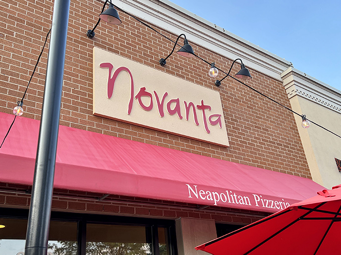 Novanta's bright red awning beckons like a pizza paradise portal. Neapolitan perfection awaits inside!