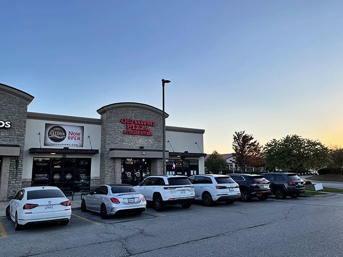 The stone facade glows at sunset, like a lighthouse guiding hungry sailors to their cheesy treasure. A full parking lot tells you everything you need to know!