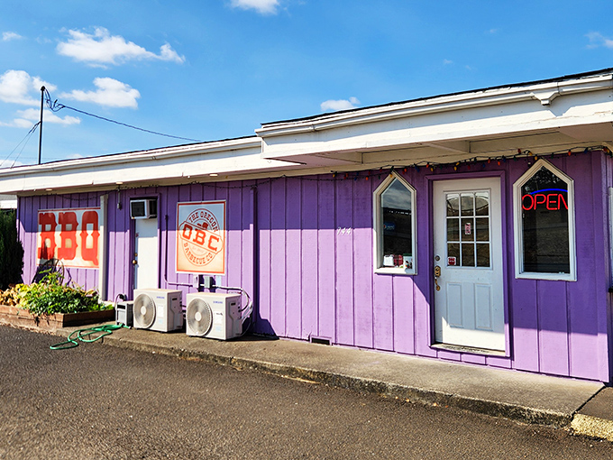 The purple palace of pork! Oregon Barbecue Company's vibrant exterior promises smoky delights inside this unassuming roadside gem.