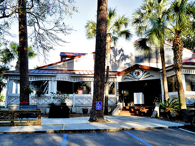 Palmetto Bay SunRise Cafe: A charming white porch welcomes you like an old friend. Those palm trees aren't just for show—they're promising you're about to taste vacation.