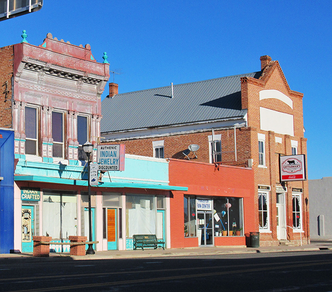 Historic brick buildings line Panguitch's Main Street, where time moves slower and your dollar stretches further.