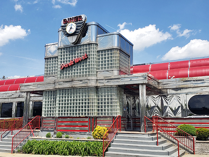 The gleaming silver exterior of Park West Diner shines like a time machine to the golden age of roadside dining.