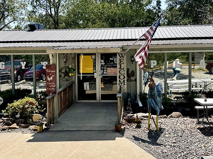 The welcoming entrance to Peggy Sue's Place, where that American flag promises both patriotism and pancakes worth saluting.